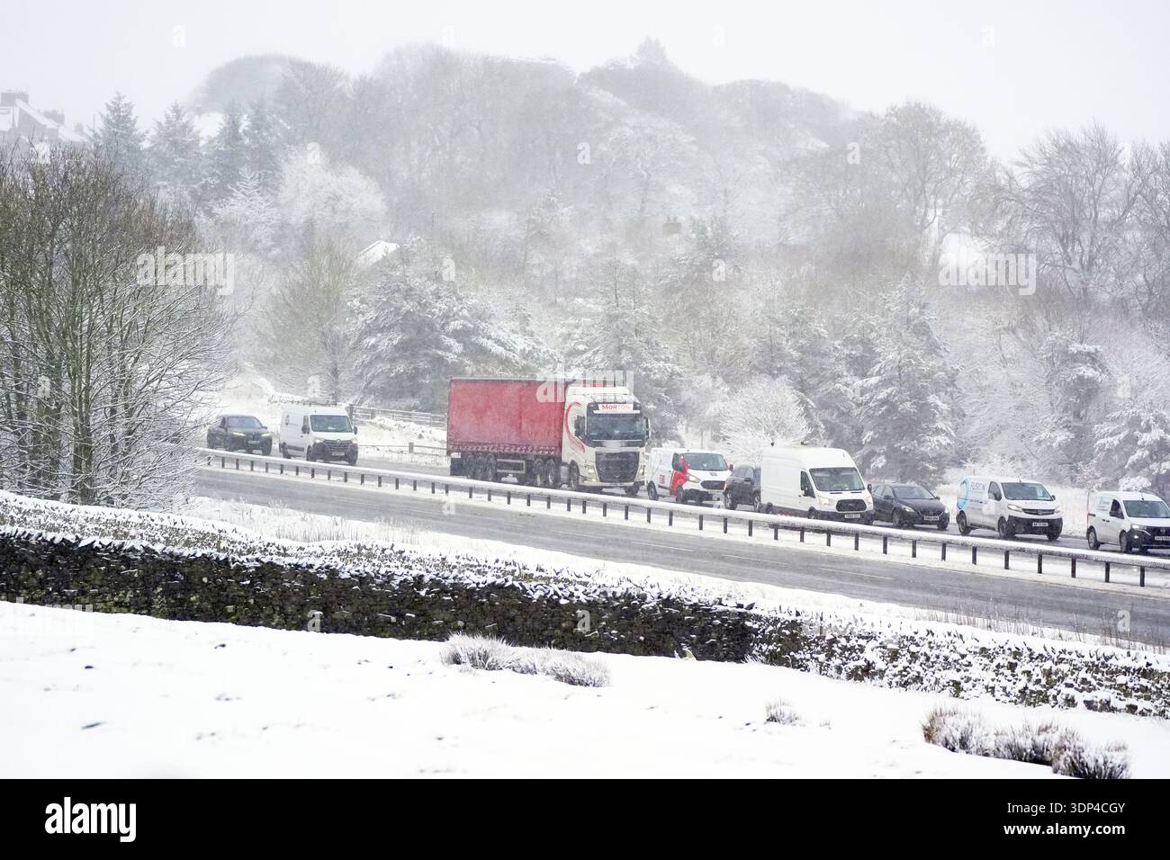 Cars and lorries queue on the A66 at Bowes Durham after the road was ...