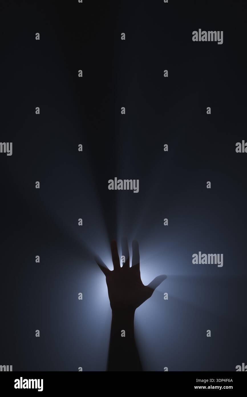 Raised hand symbolism hi-res stock photography and images - Alamy