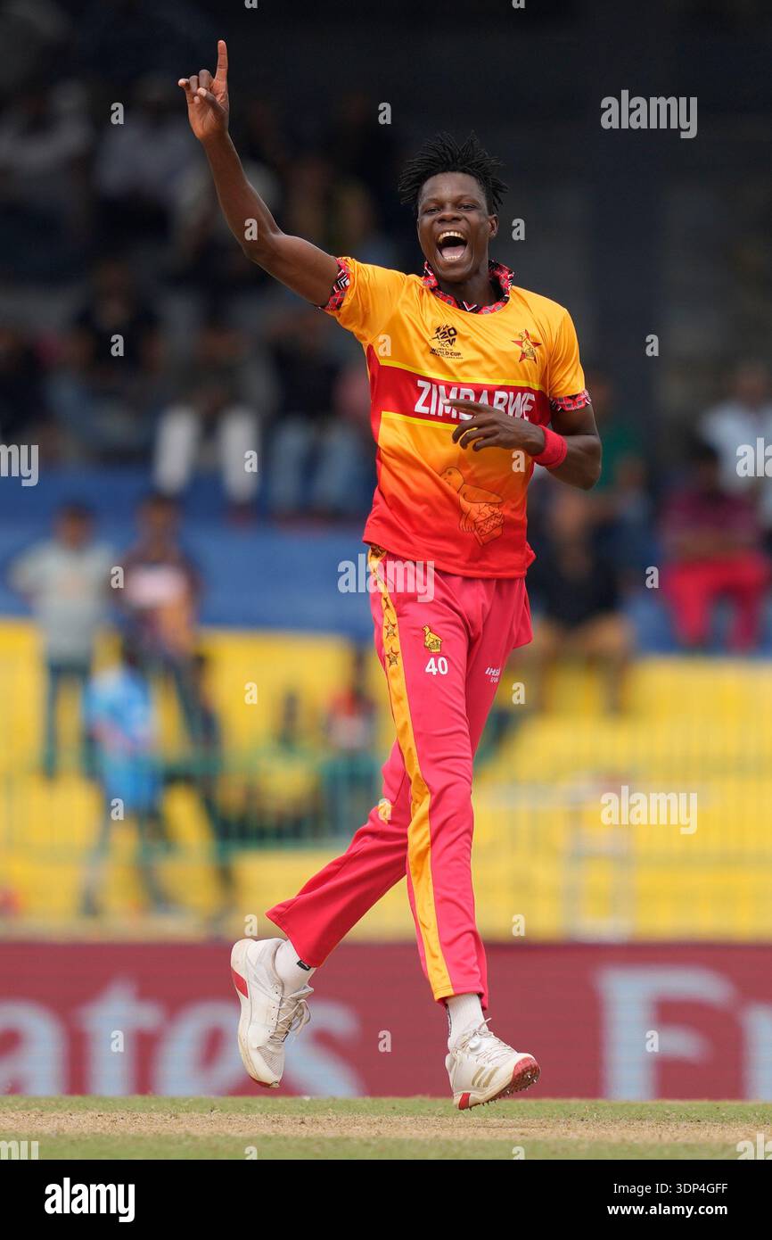 Zimbabwe's Blessing Muzarabani celebrates the wicket of Australia's ...