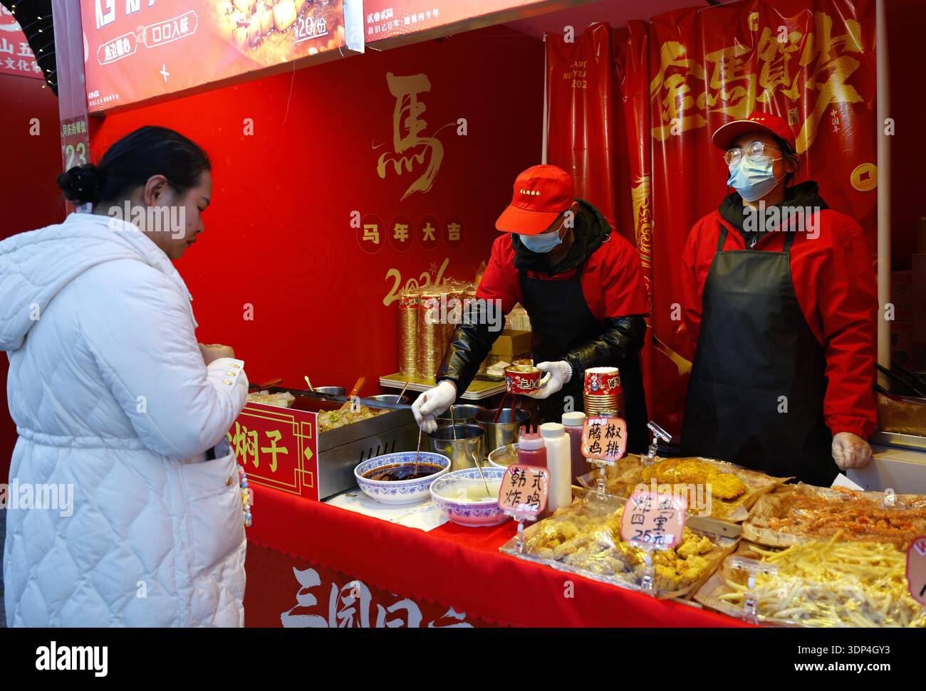 Visitors admire lanterns at Tongqing Street in the Summer Palace in ...