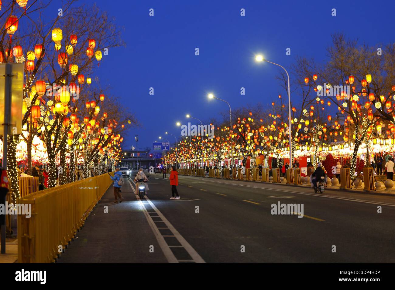 Visitors admire lanterns at Tongqing Street in the Summer Palace in ...