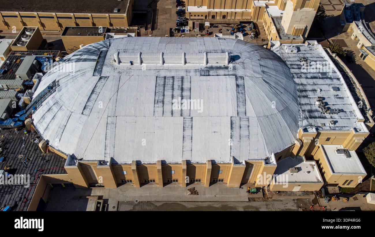 Aerial view of the Moody Coliseum, a massive dome structure surrounded ...