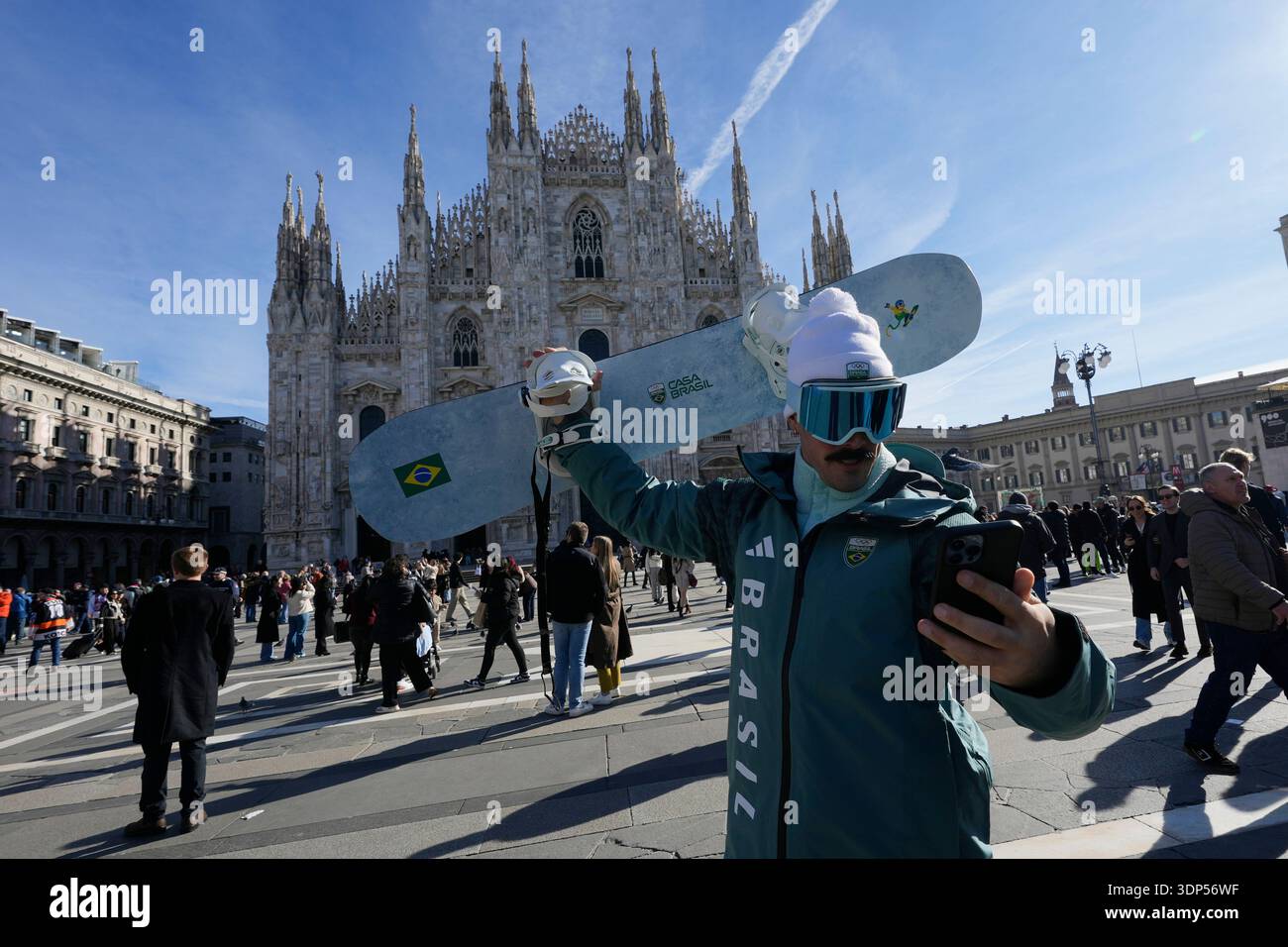 Brazilian swimmer Bruno Fratus takes a photo, in front of the Duomo ...
