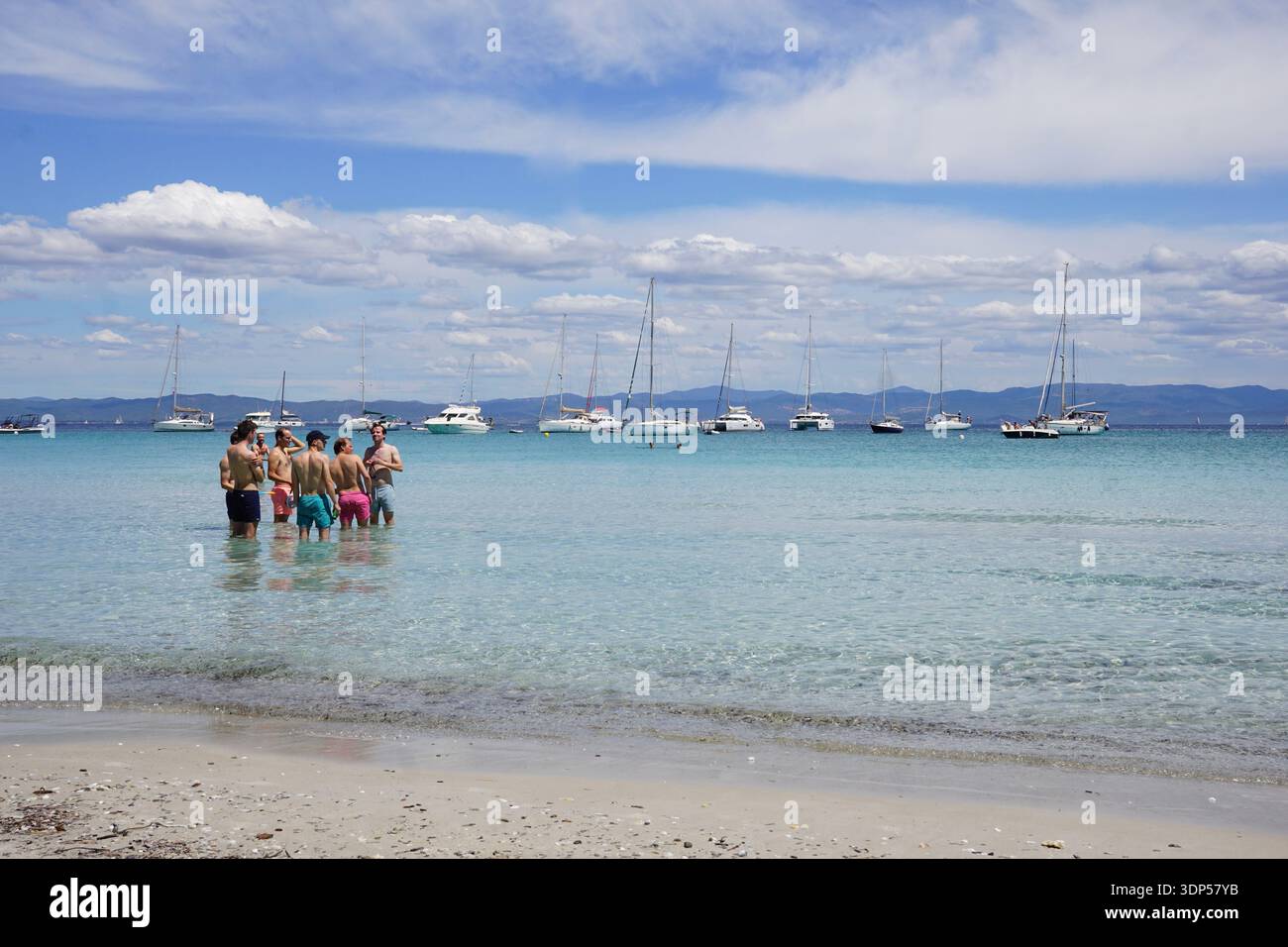 Beachgoers enjoying shallow water hi-res stock photography and images ...