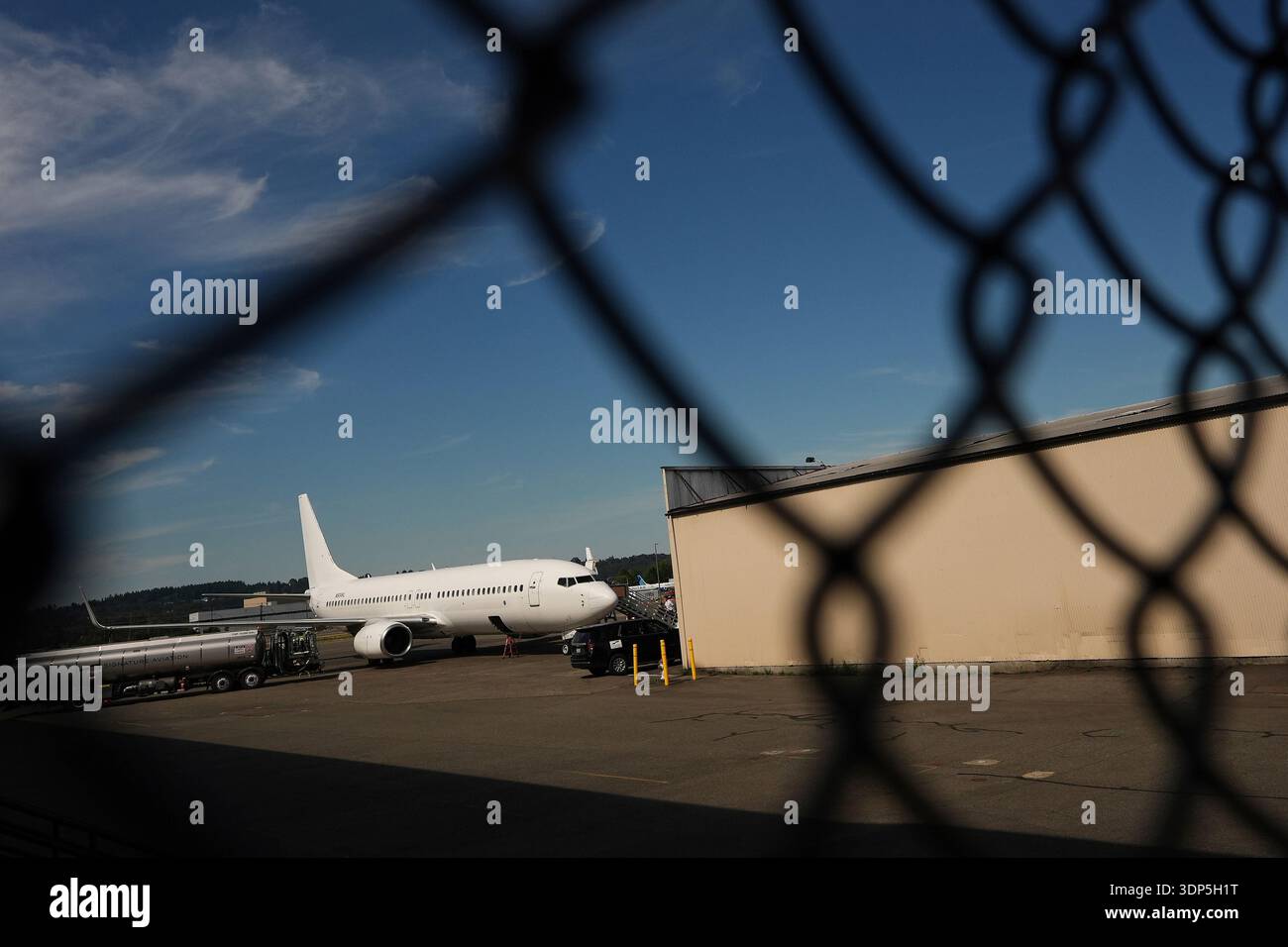 FILE - A U.S. Immigration and Customs Enforcement flight operates out ...