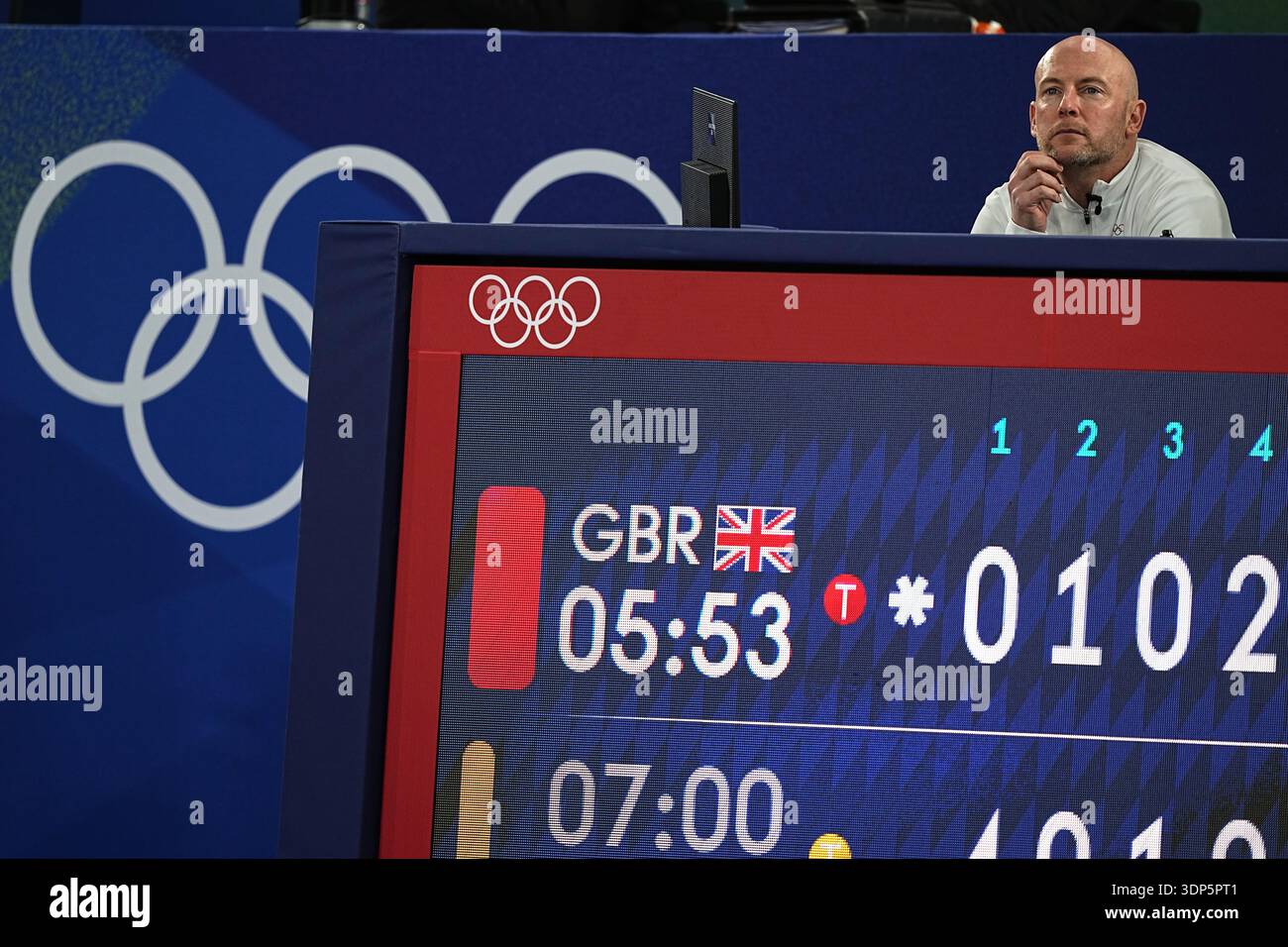 Italy coach Ryan Fry watches the men's curling round robin session ...
