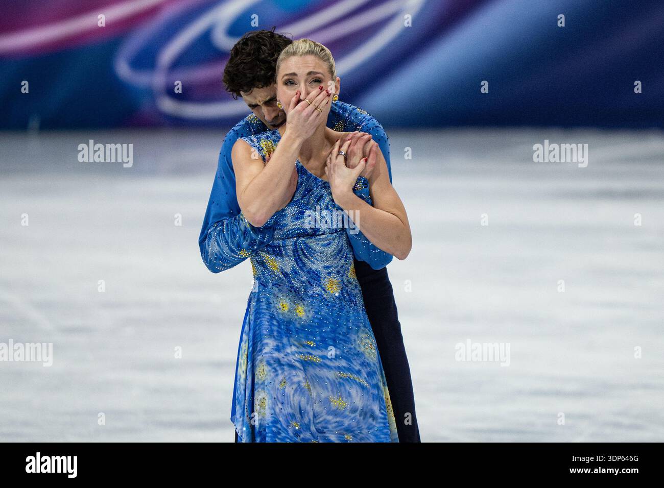 Piper Gilles and Paul Poirier of Canada celebrate during the Figure ...