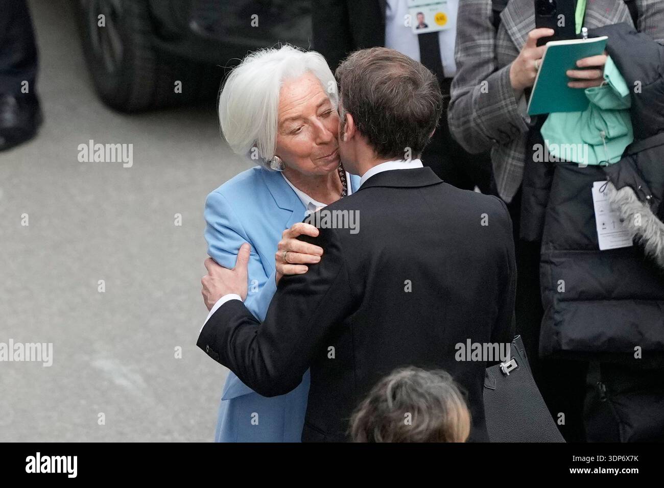 French President Emmanuel Macron, right, greets President of the ...