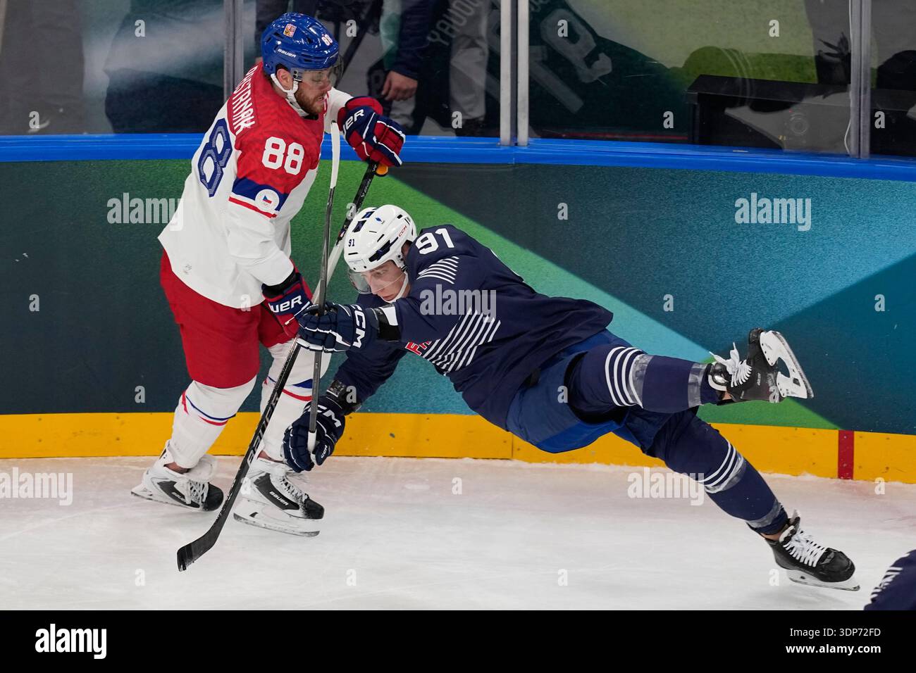 Czechia's David Pastrnak, left, challenges France's Floran Douay during ...