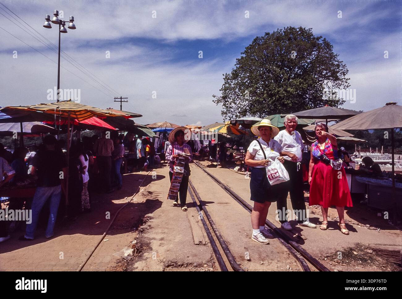 Tourists congregate at Kanchanburi railway station en-route to visit ...