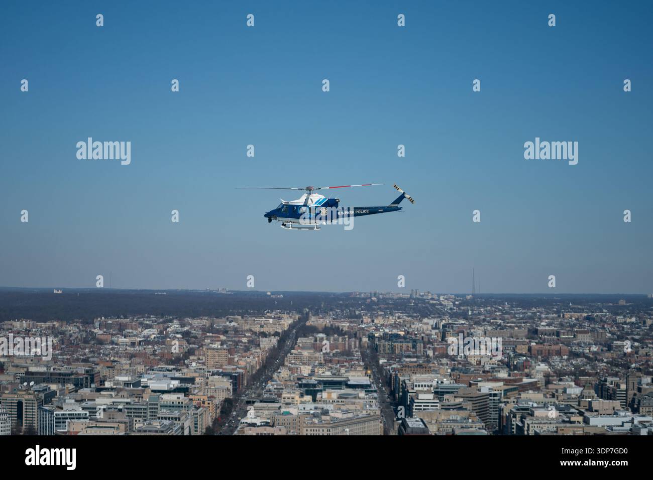 A U.S. Park Police helicopter flies over the National Mall, as seen ...