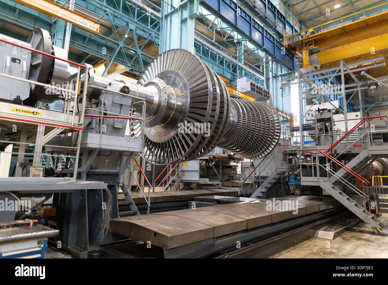 An Arabelle Solutions' employee work on a steam turbine rotor for ...