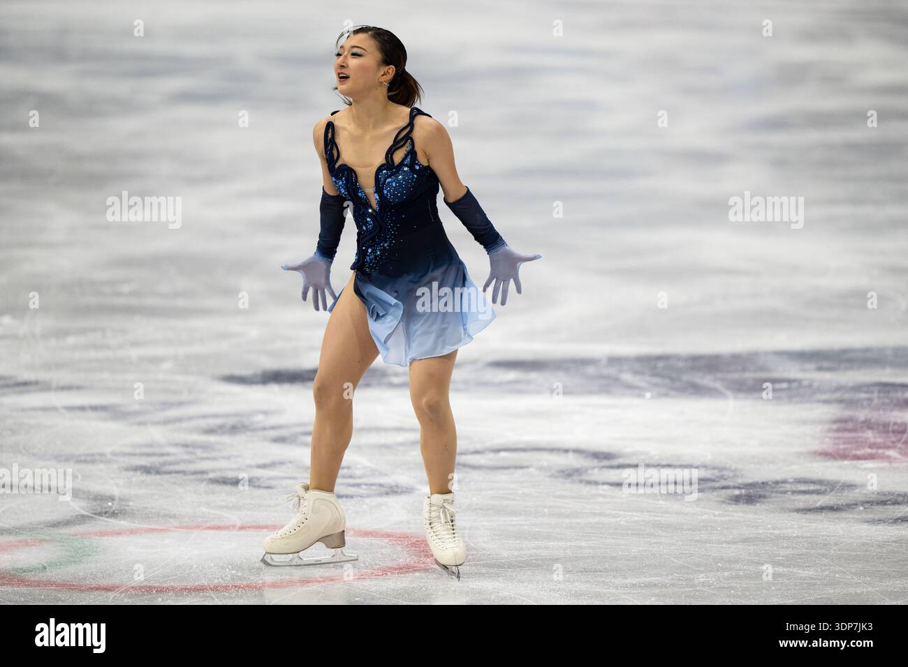 Kaori Sakamoto (10) of Team Japan performs during the Team Event ...