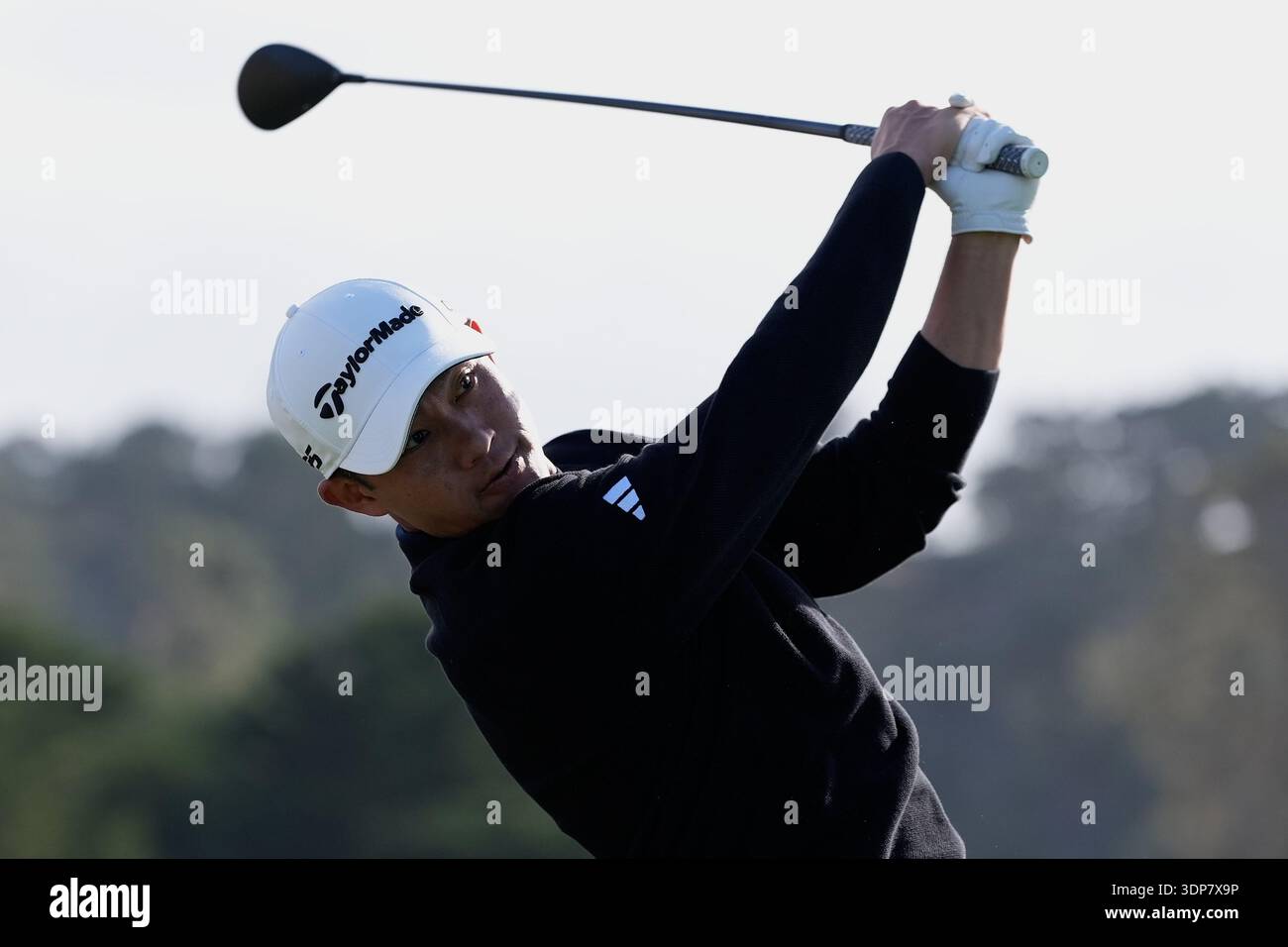 Collin Morikawa hits from the third tee at Pebble Beach Golf Links ...