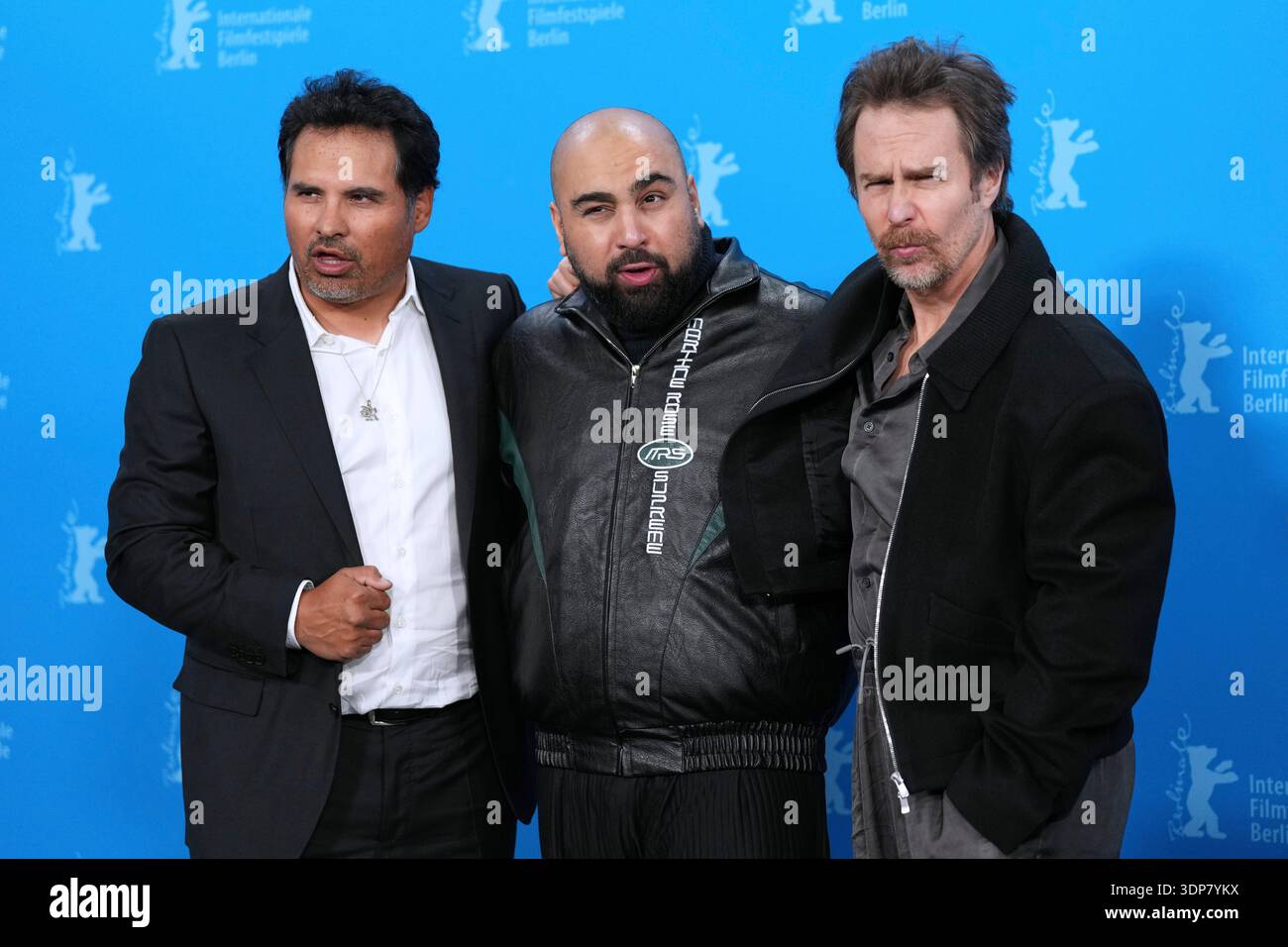 Michael Pena, from left, Sam Rockwell, and Asim Chaudhry pose for ...