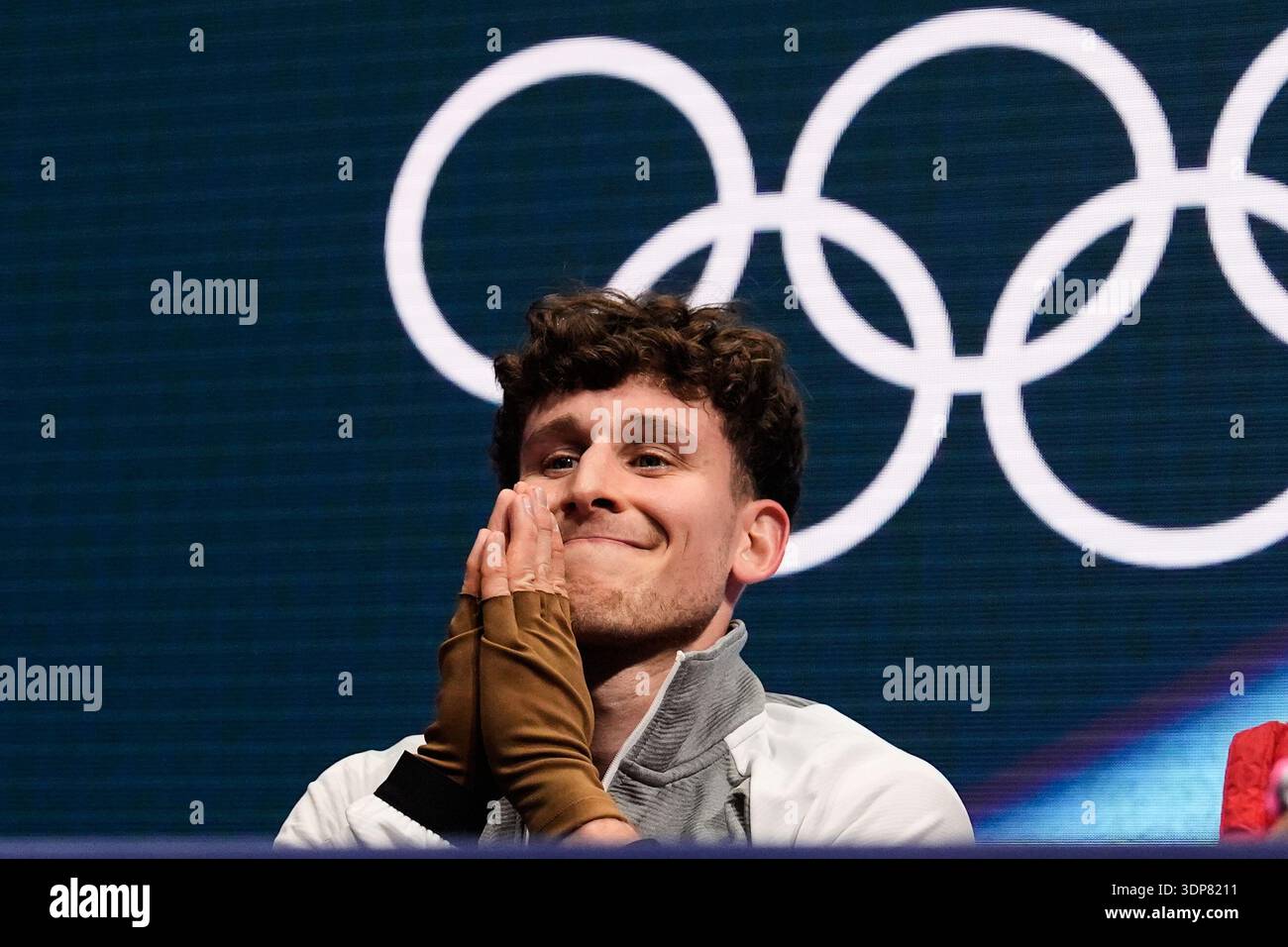 Lukas Britschgi of Switzerland reacts to his scores after competing ...