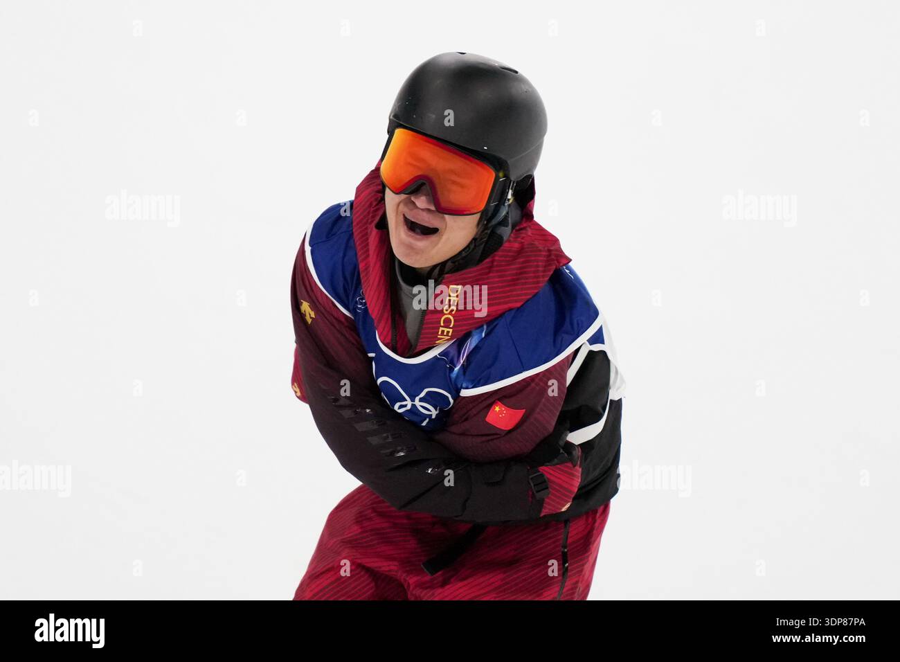 China's Wang Ziyang celebrates during the men's snowboarding halfpipe ...