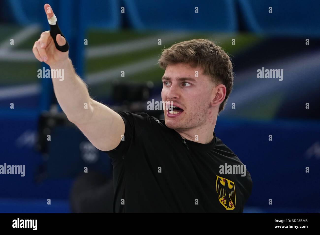 Germany's Johannes Scheuerl gestures during the men's curling round ...