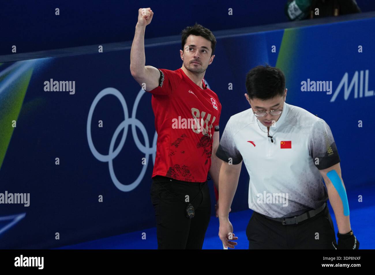 Switzerland's Schwarz-van Berkel Benoit reacts after the men's curling ...