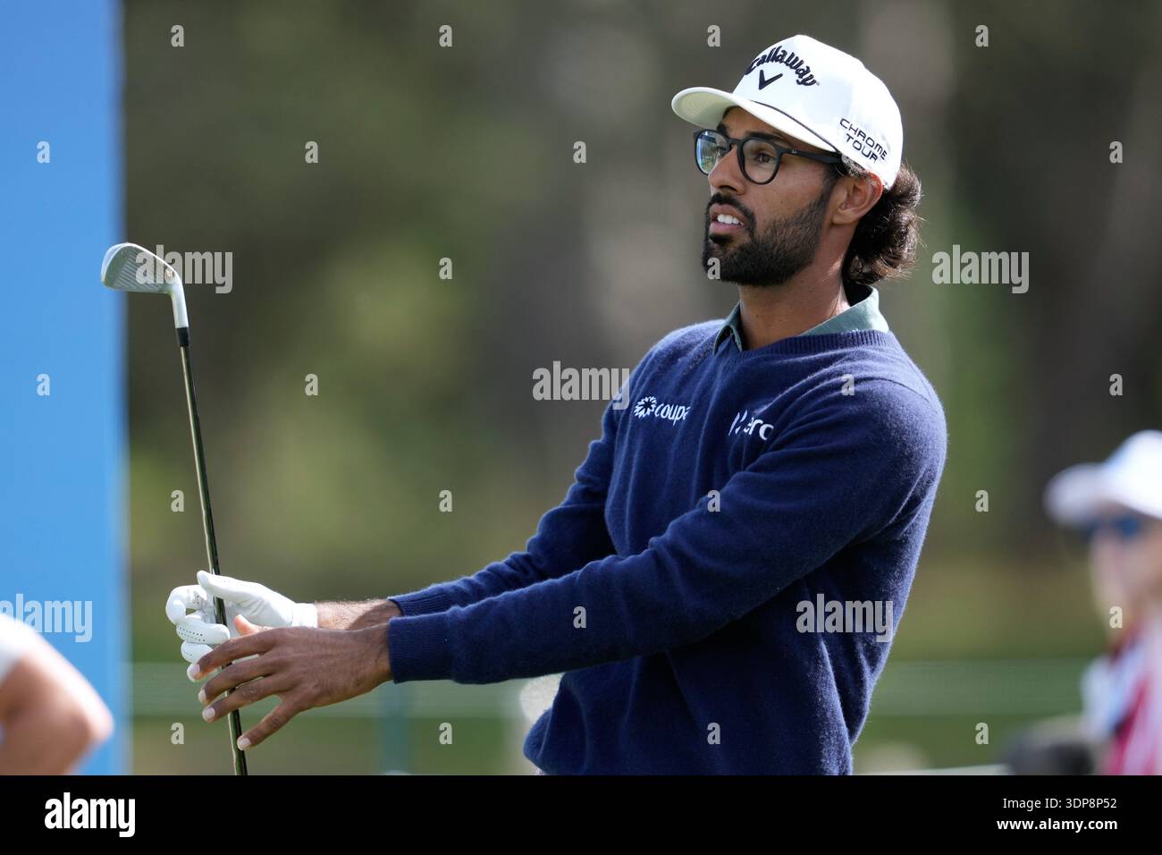 Akshay Bhatia watches his shot from the fifth tee at Spyglass Hill Golf ...