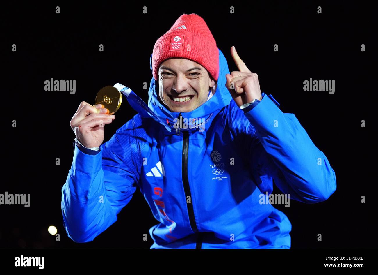 Great Britain's Matt Weston celebrates on the podium with the gold ...