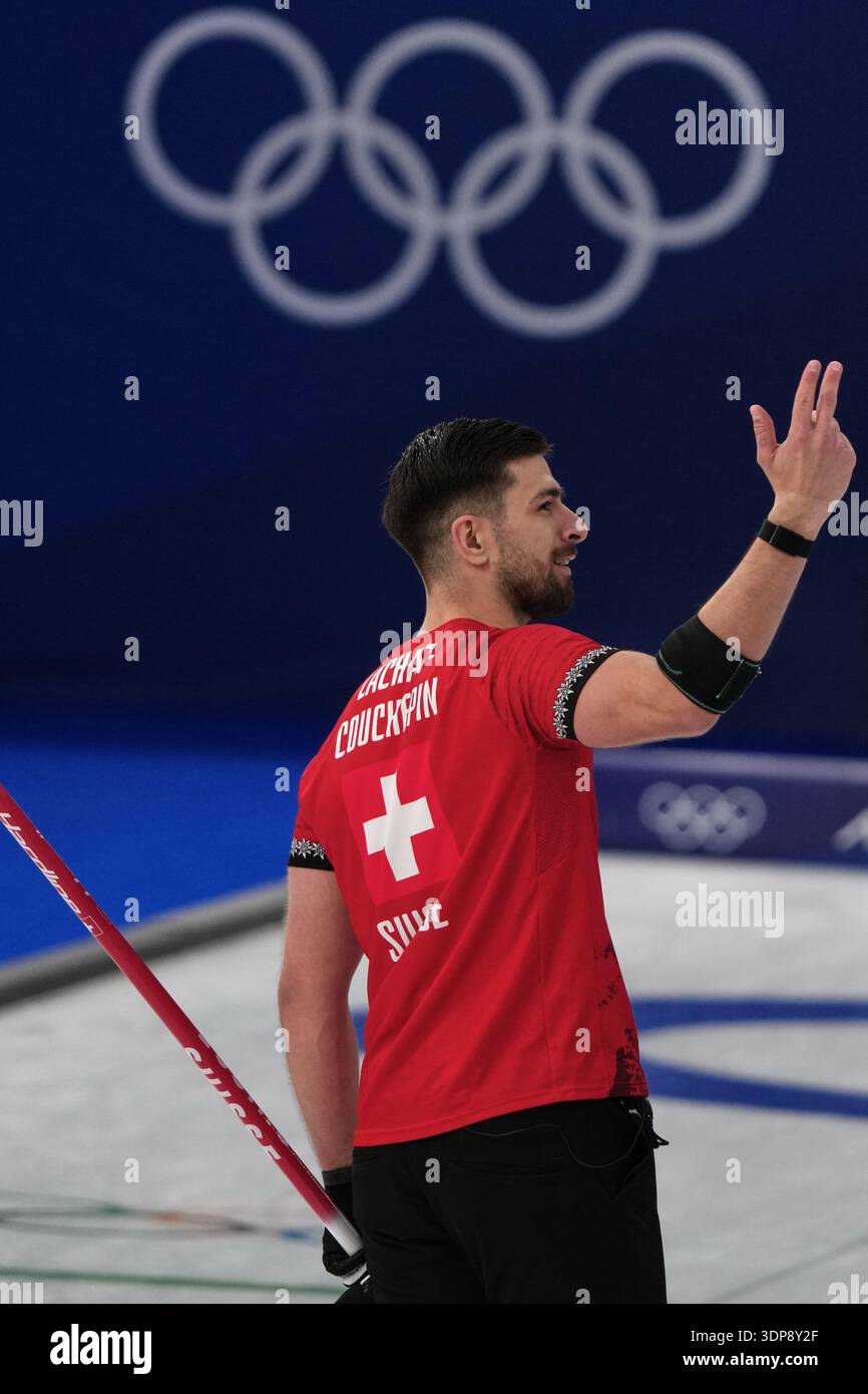 Switzerland's Pablo Lachat-Couchepin reacts after the men's curling ...