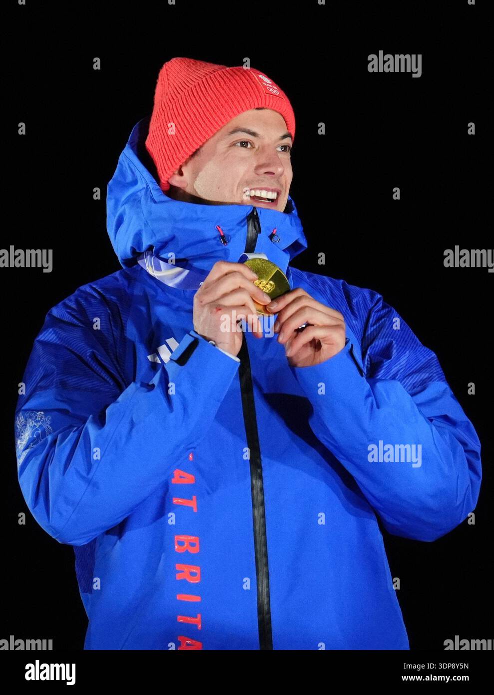 Great Britain's Matt Weston celebrates on the podium with the gold ...