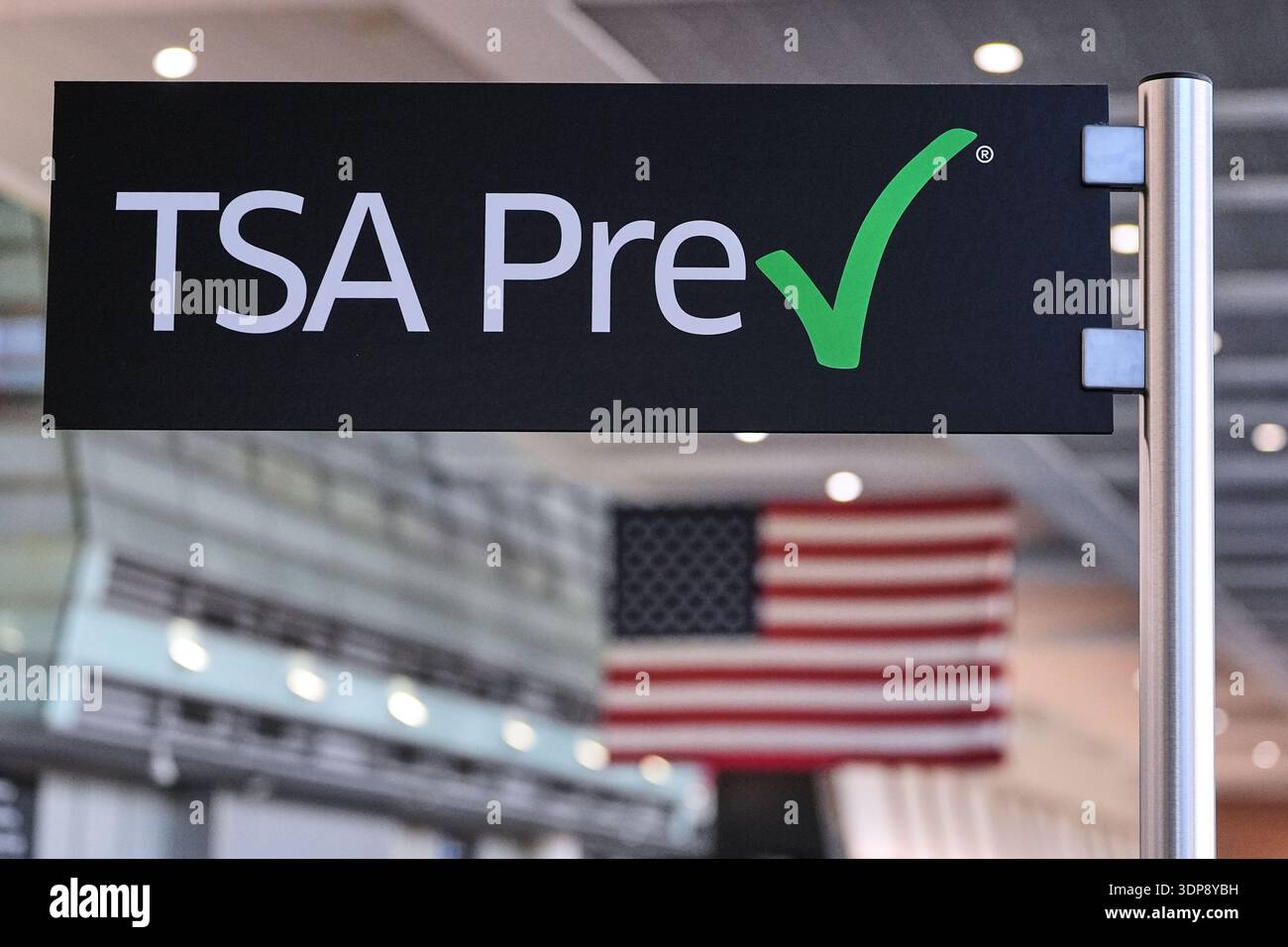 FILE - A TSA Pre sign is posted at a security line in Terminal A at ...