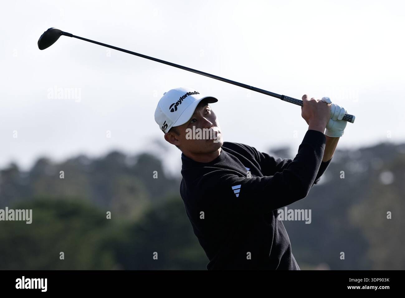 Collin Morikawa hits from the third tee at Pebble Beach Golf Links ...
