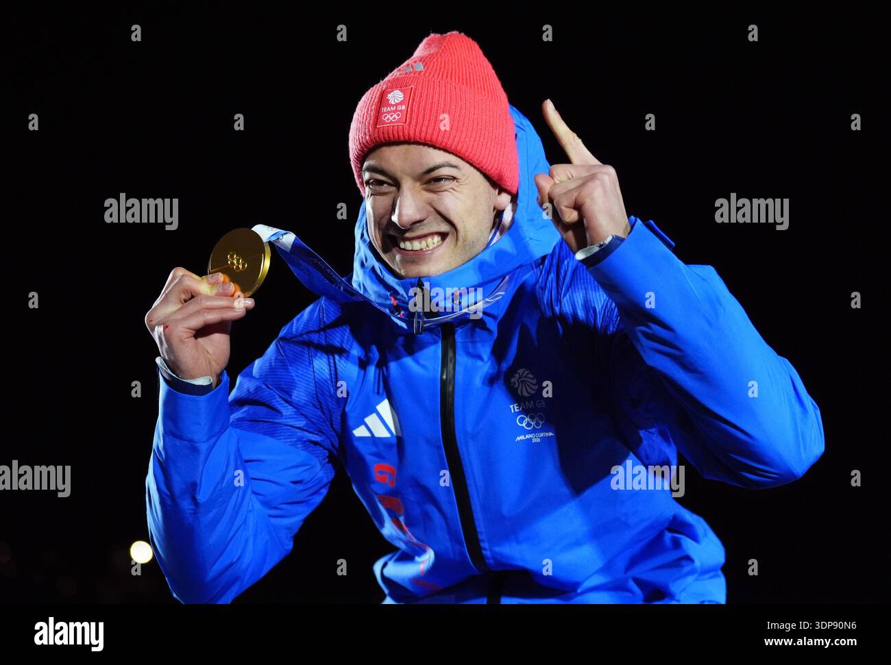 Great Britain's Matt Weston celebrates on the podium with the gold ...