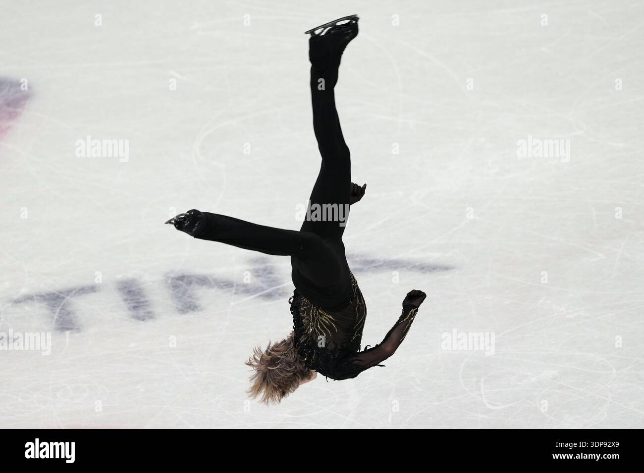 Ilia Malinin of the United States does a back flip while competing ...