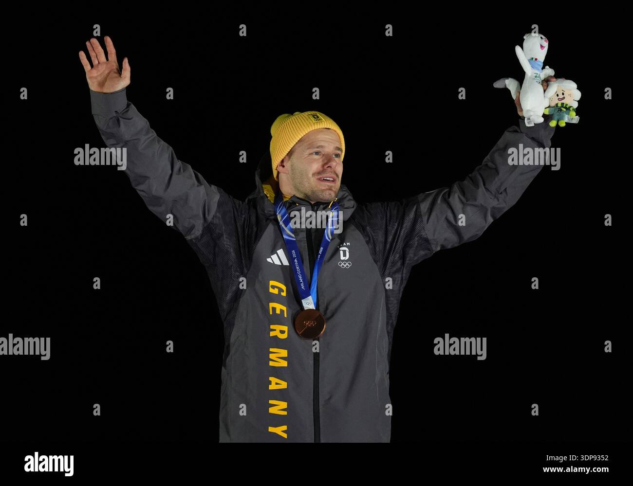Germany's Christopher Grotheer on the podium with the silver medal ...