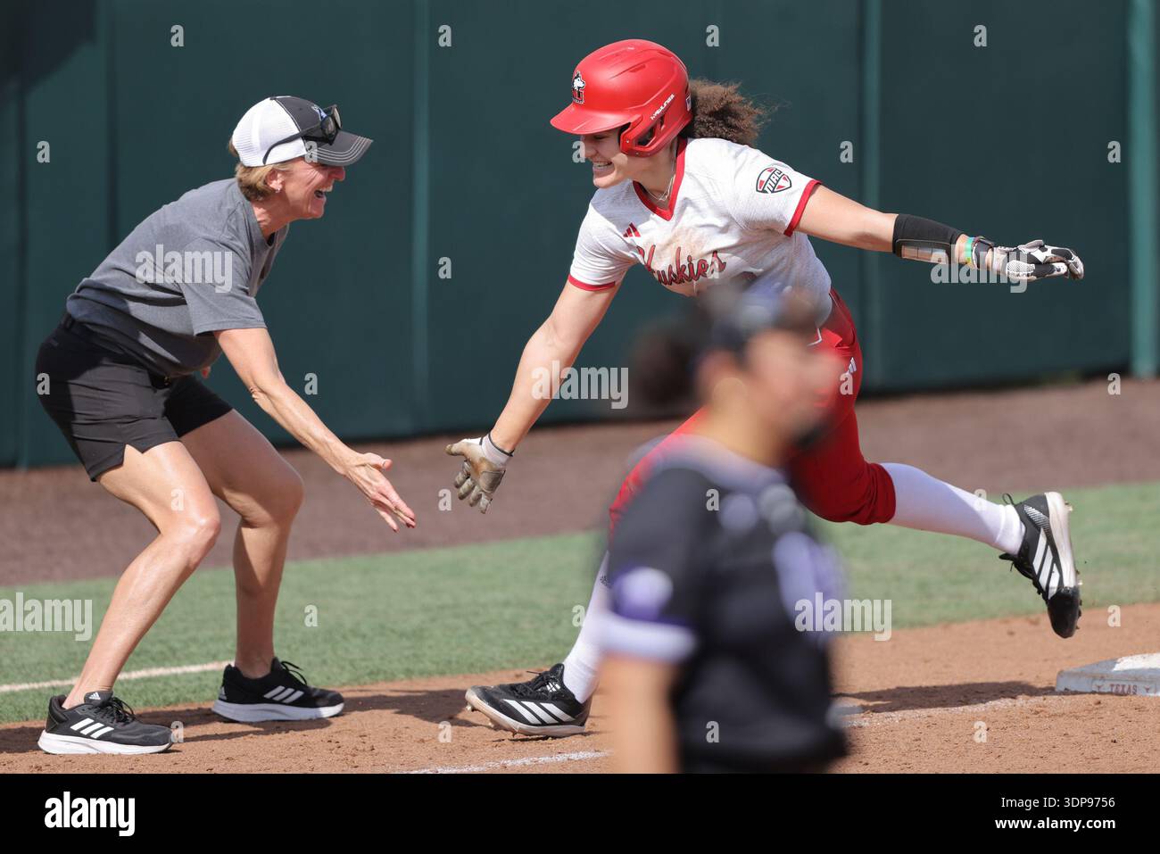Northern Illinois first baseman Danielle Stewart celebrates a home-run ...