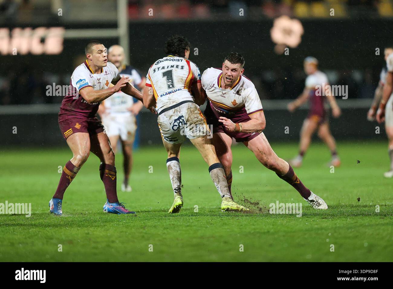 Tui Lolohea and James Greenwood tackle Charlie Staines during the ...
