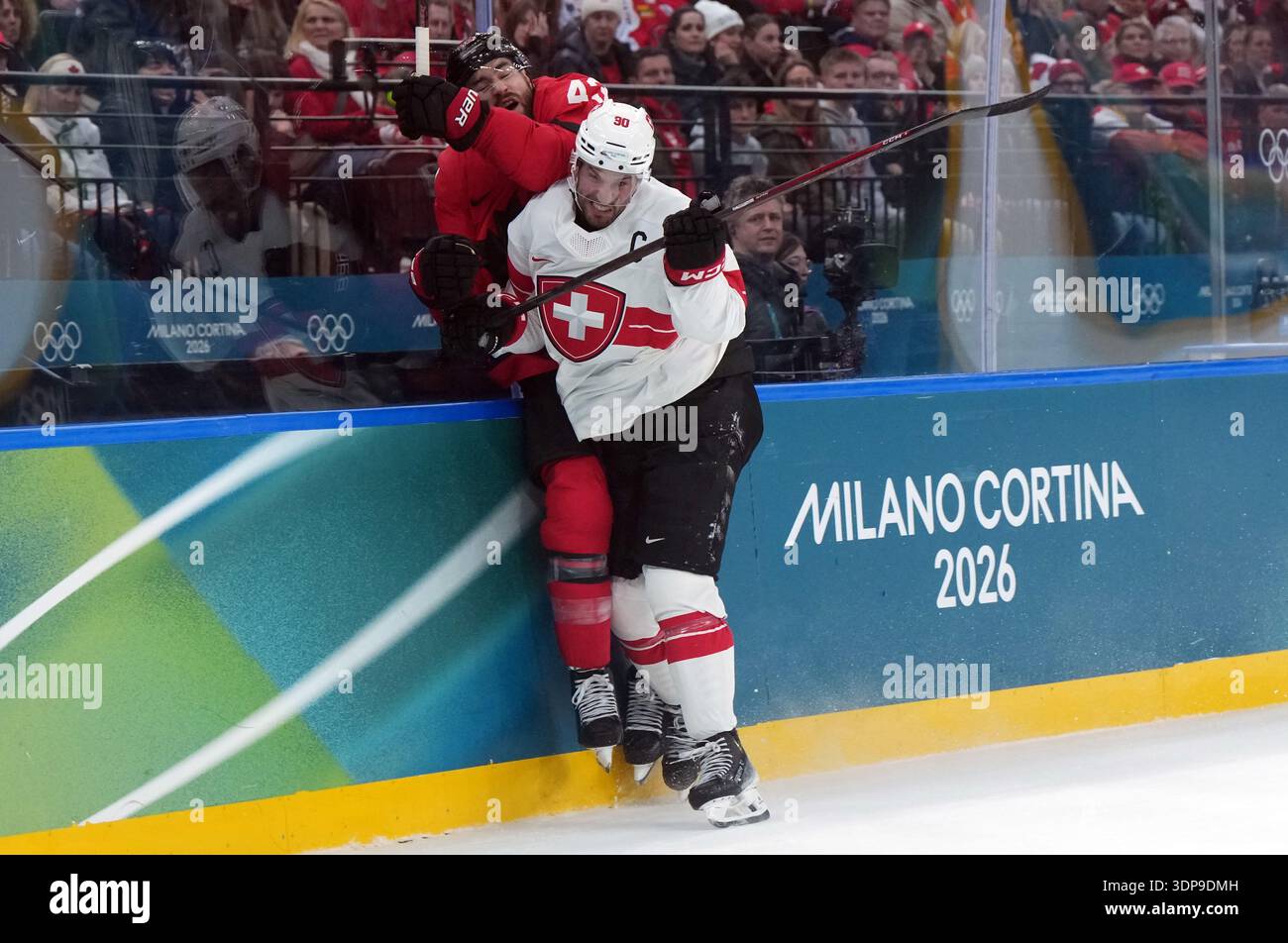 Switzerland's Roman Josi (90) checks Canada's Tom Wilson (43) during ...