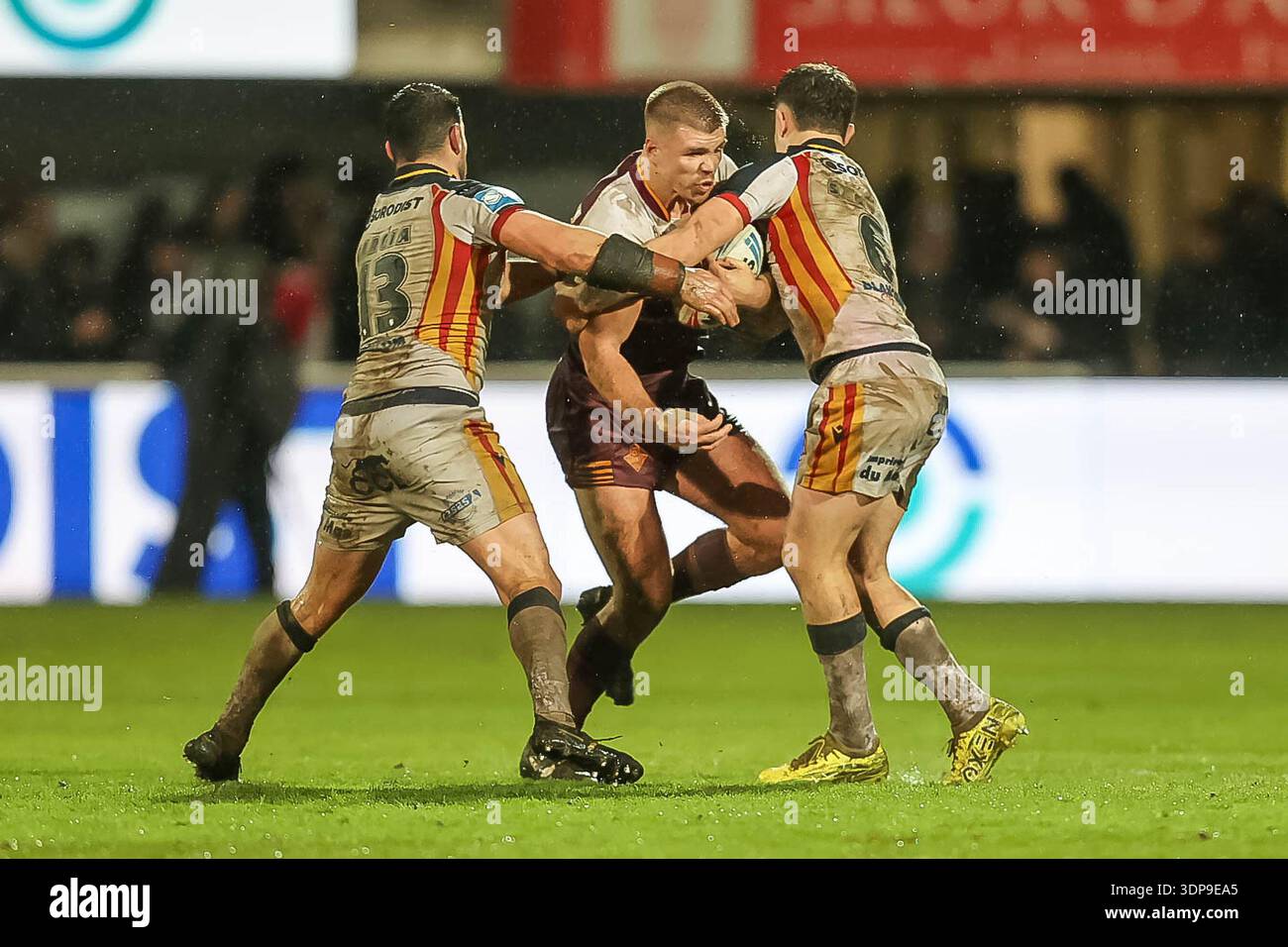 Harry Rushton looks for a way past Benjamin Garcia and Toby Sexton ...