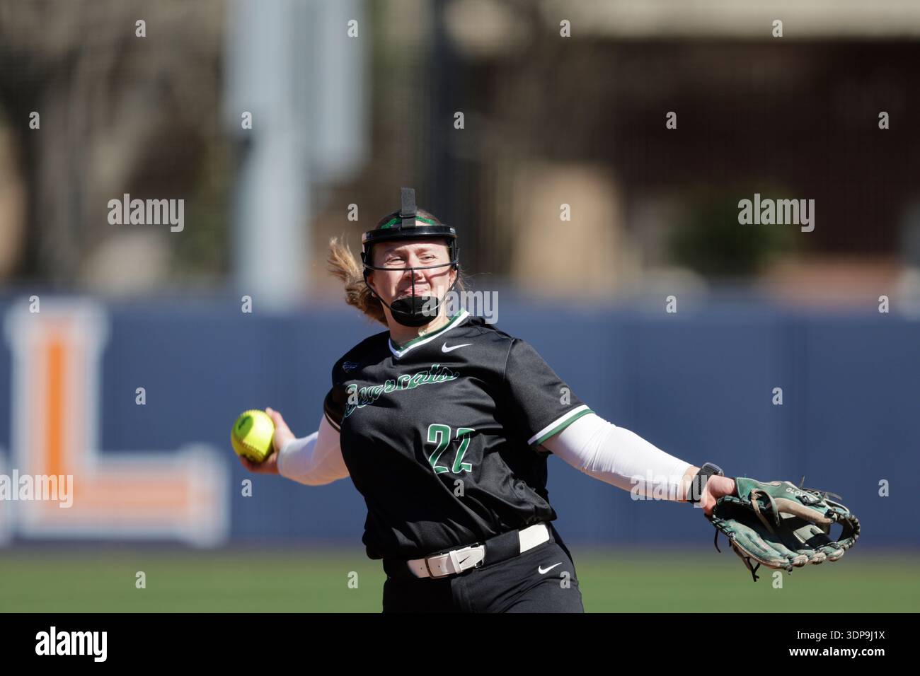 Binghamton's Delaney Glover (22) pitches during an NCAA softball game ...