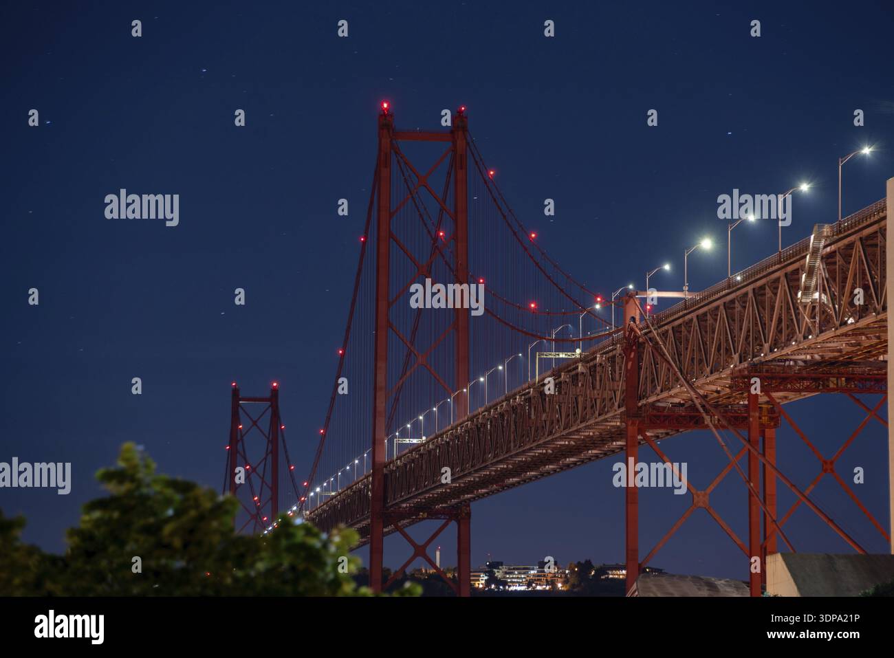 Iconic red bridge of the 25 April in Lisboa at night, Portugal Stock ...