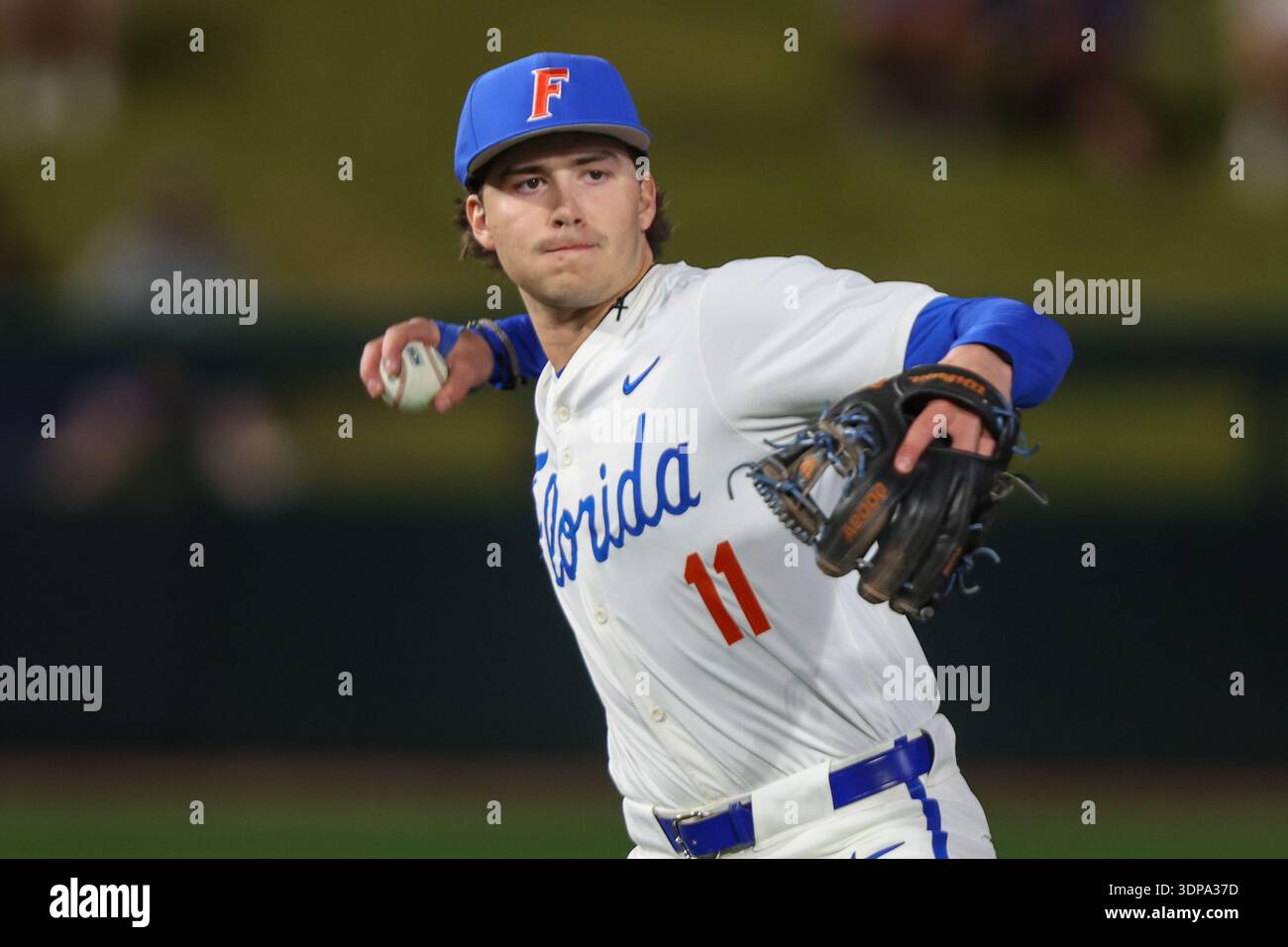 Florida infielder Brendan Lawson (11) warms up during an NCAA baseball ...