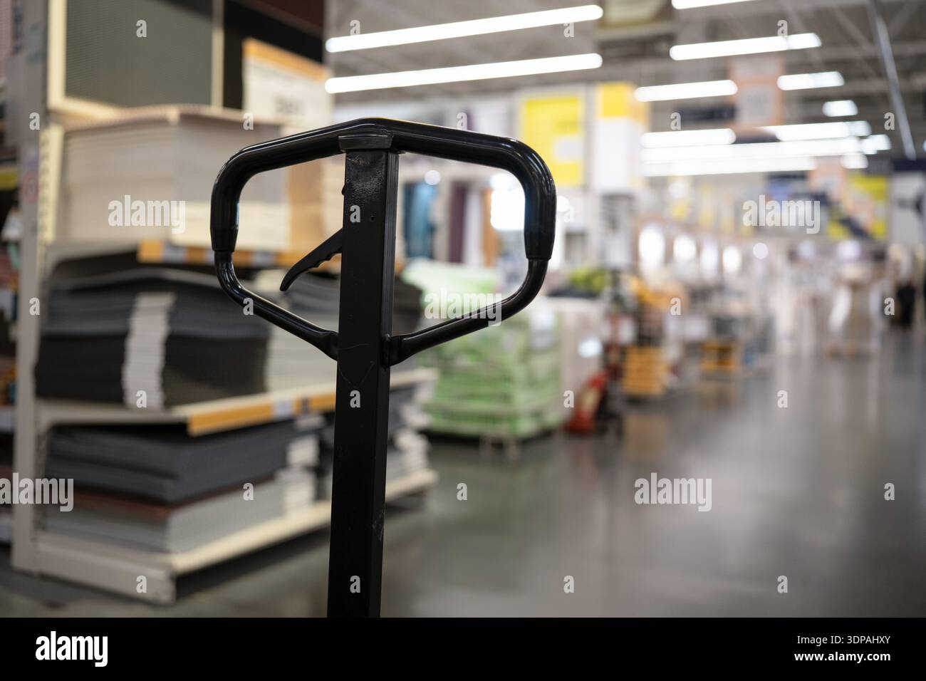 Hand pallet truck, commonly used in warehouses and retail environments ...