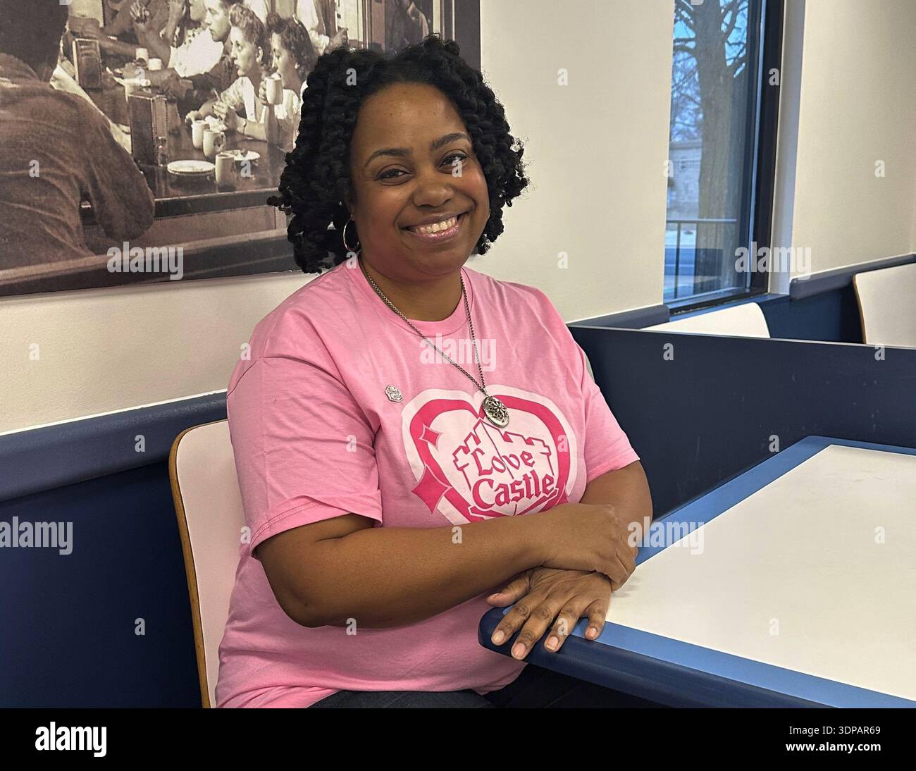 Krystal Gray, 43, of Detroit, sits at a table inside a White Castle in ...