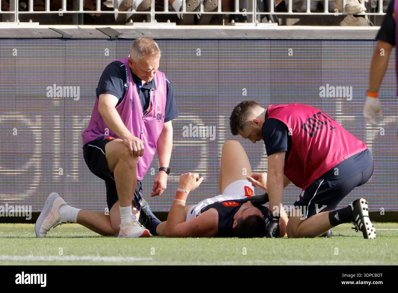 Jacob Weitering of Victoria receives medical attention during the AFL ...