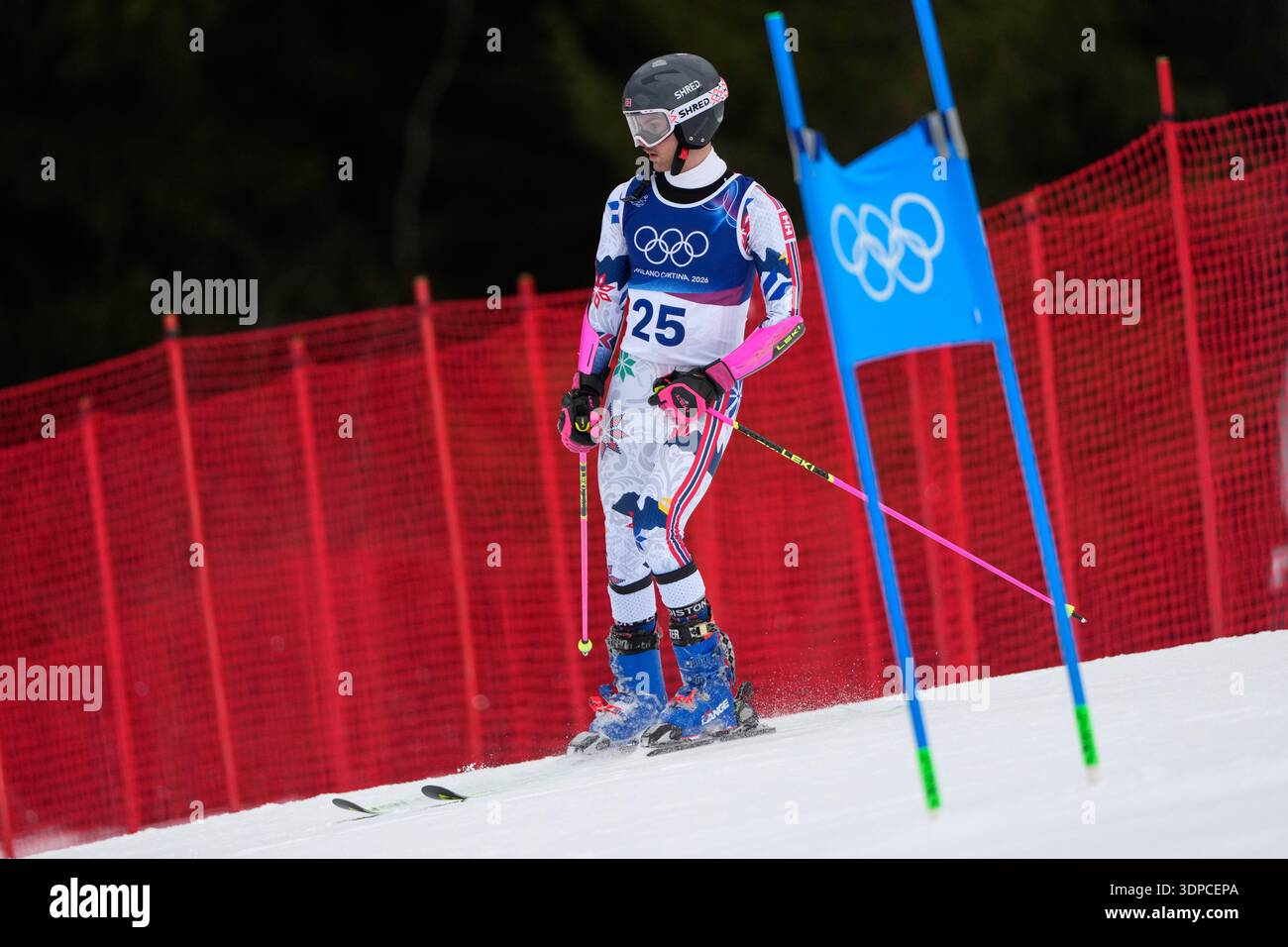 Norway's Eirik Hystad Solberg stands after skiing off the course ...