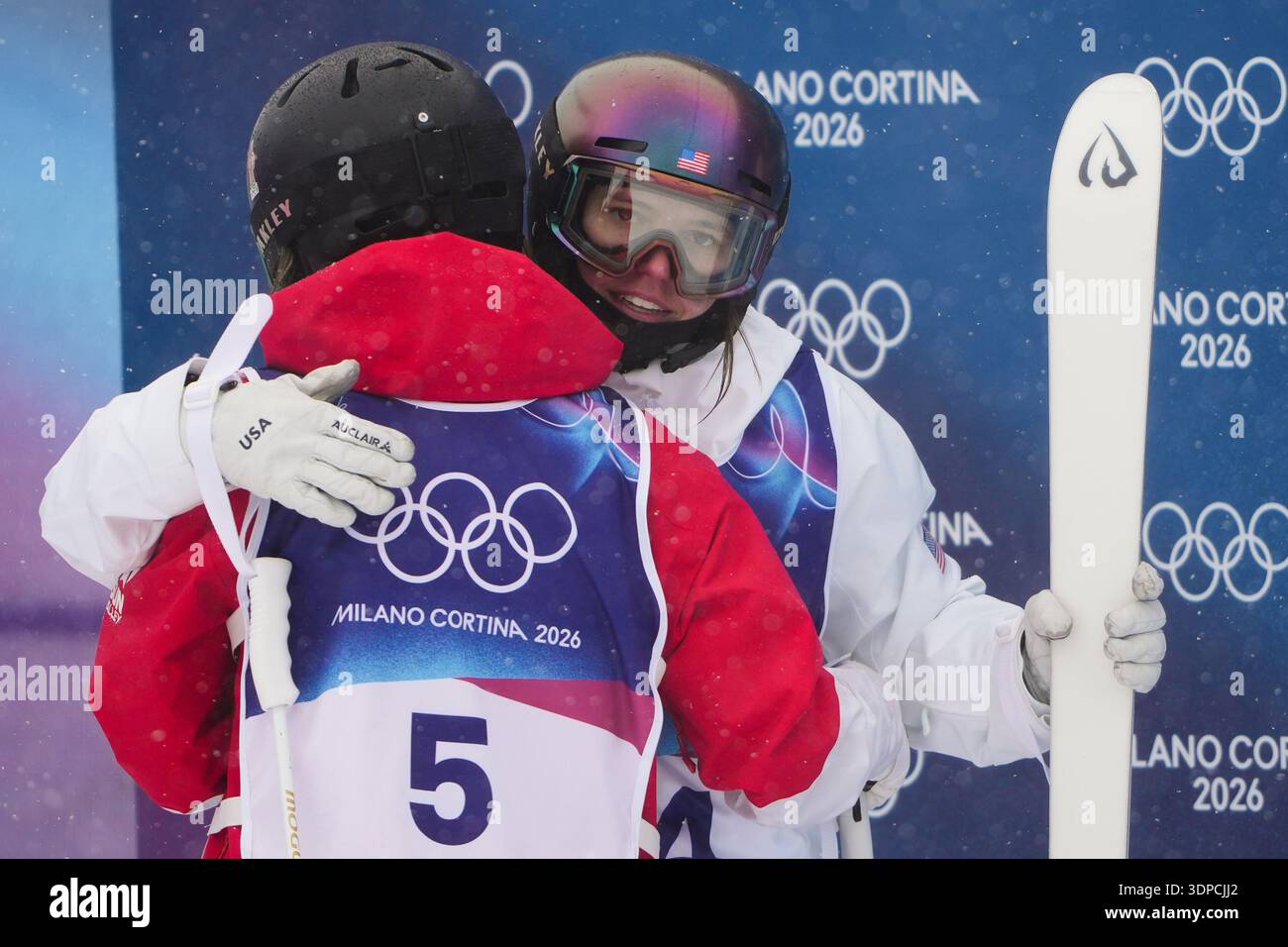 France's Perrine Laffont (5) and United States' Tess Johnson embrace ...