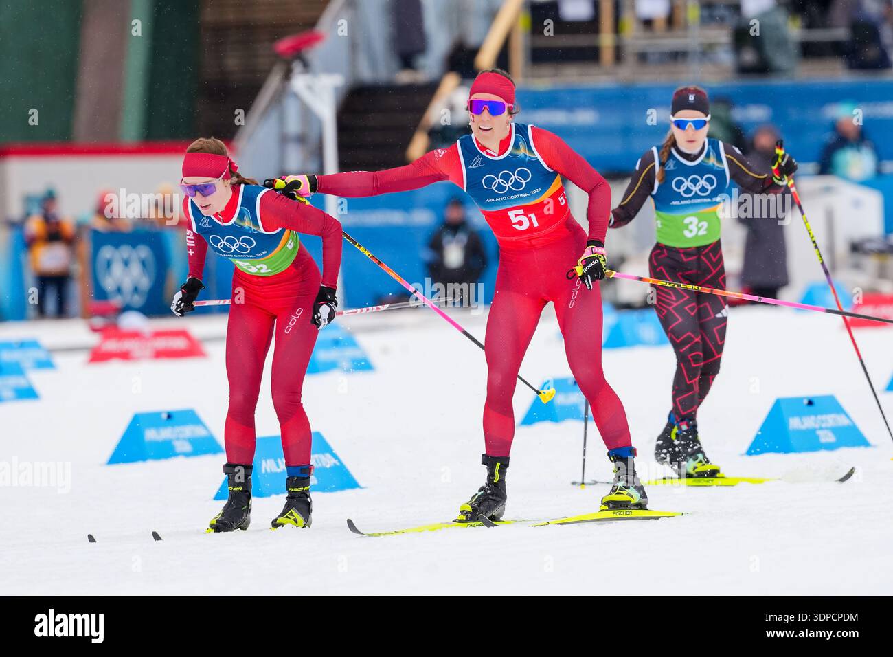 Anja Weber, of Switzerland, tags teammate Nadja Kaelin, left, during ...