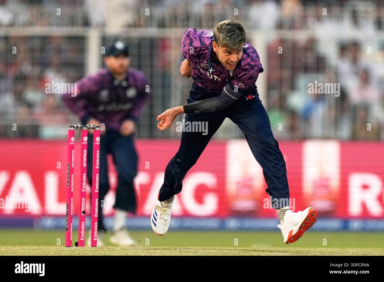 Scotland's Bradley Currie bowls a delivery during the T20 World Cup ...