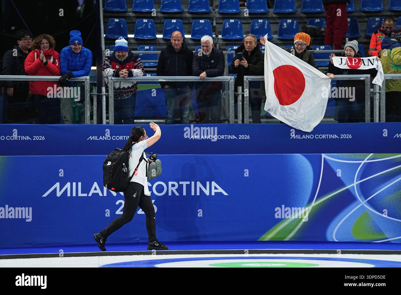 Japan's fans cheer Japan's Anna Ohmiya after the team's win in the ...