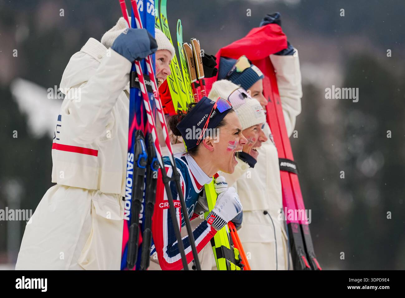Heidi Weng, of Norway, center, and her teammates celebrate after ...