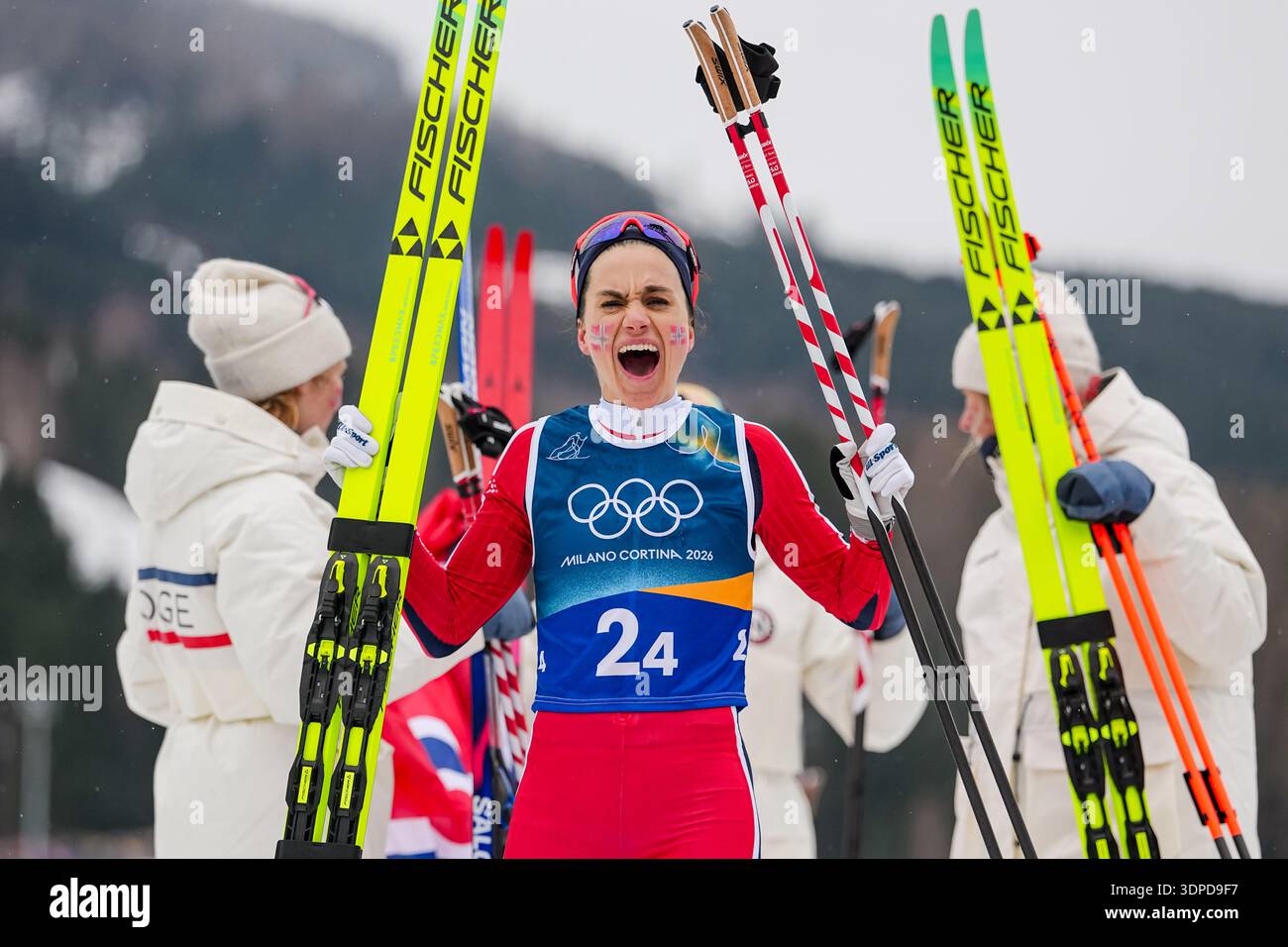 Heidi Weng, of Norway, celebrates after winning the gold medal in the ...