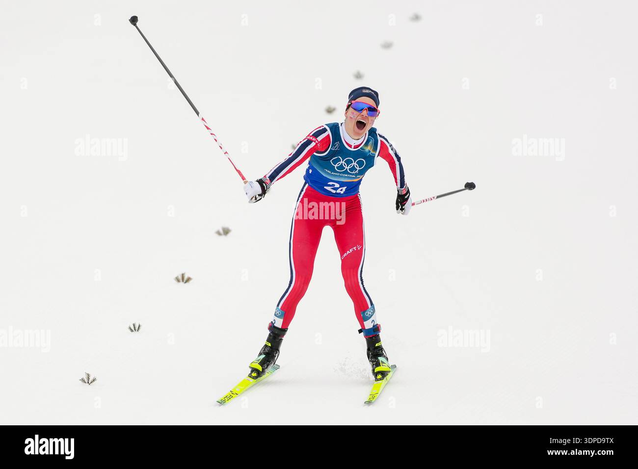 Heidi Weng, of Norway, celebrates as she approaches the finish line to ...